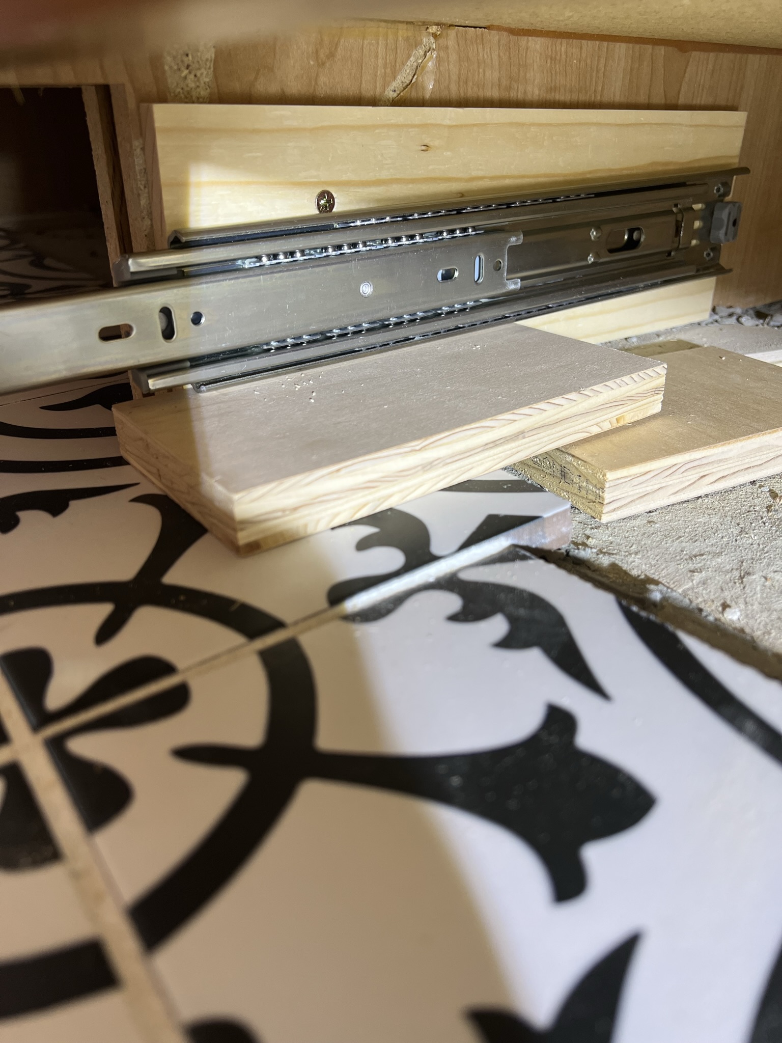 How to Build a Pull-Out Stool Drawer - livingstartsathome.com