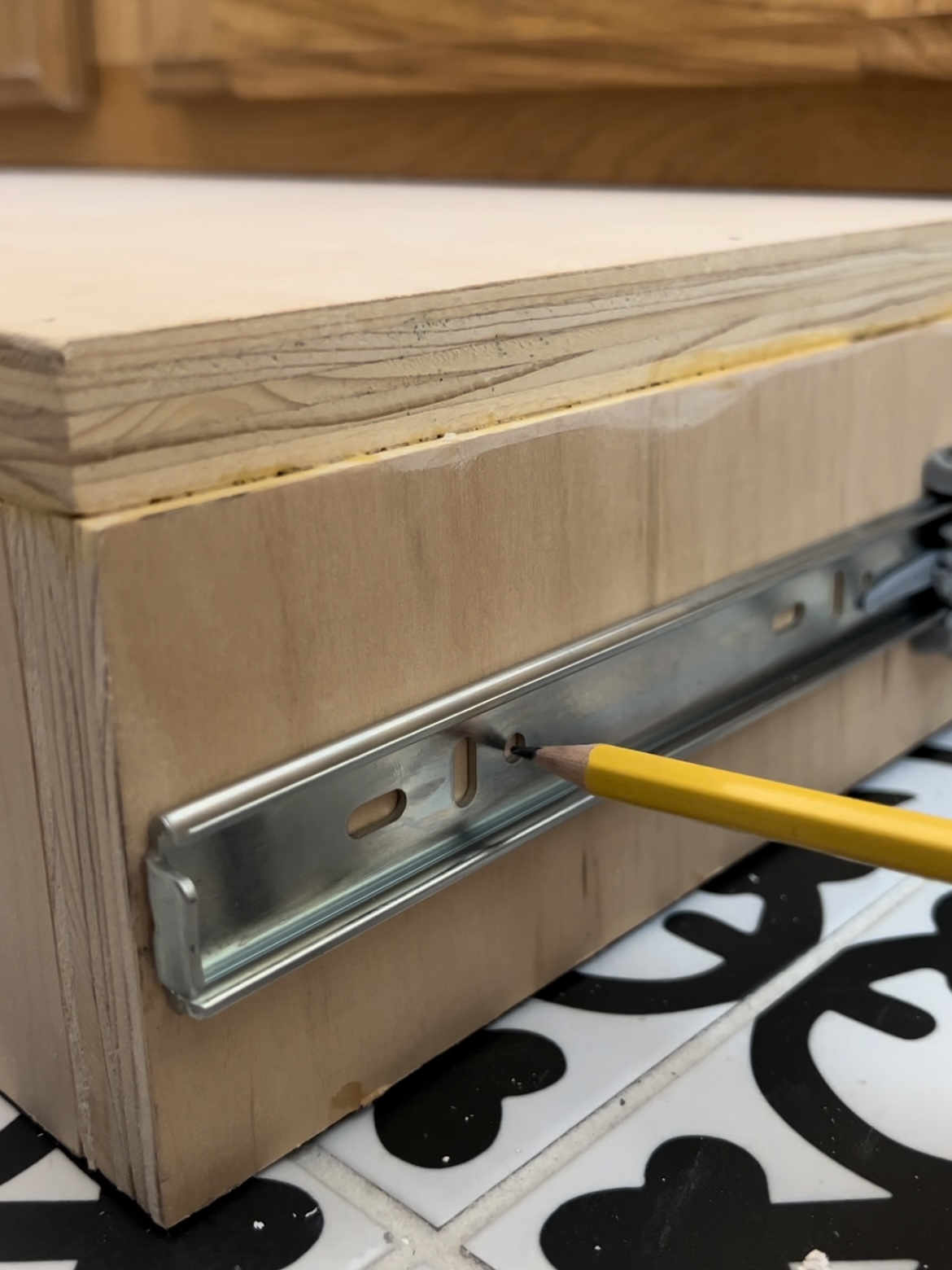How to Build a Pull-Out Stool Drawer - livingstartsathome.com